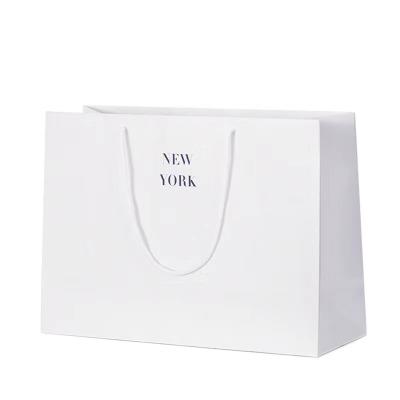 Cina Pantone colora la borsa del regalo di promozione di stampa offset dei sacchi di carta di Kraft della scarpa dell'abbigliamento in vendita