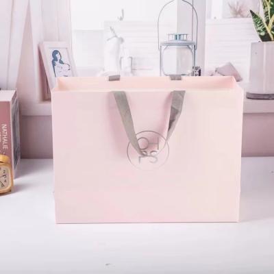 Cina logo su ordinazione dei sacchi di carta di rosa di 28.5*8*40cm in vendita