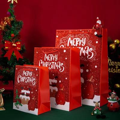 Cina sacchi di carta del regalo di Natale di 26*32*12cm in vendita