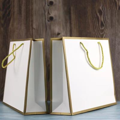 Cina sacchi di carta dell'abbigliamento di 43*12.5*32cm in vendita
