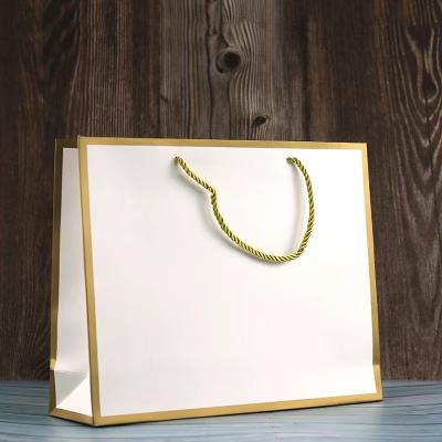 Cina sacchi di carta dell'abbigliamento di 43*12.5*32cm in vendita