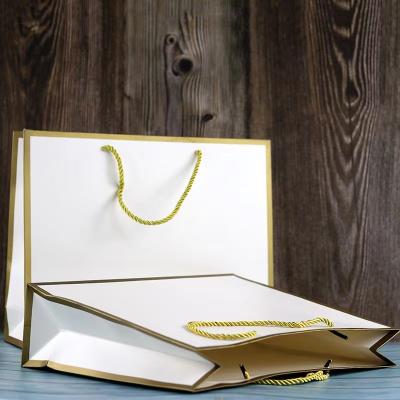 Cina sacchi di carta dell'abbigliamento di 43*12.5*32cm in vendita
