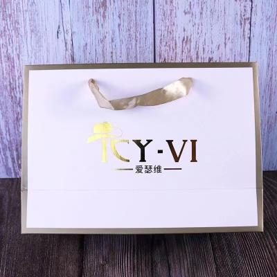 Cina sacchi di carta dell'abbigliamento di 43*12.5*32cm in vendita