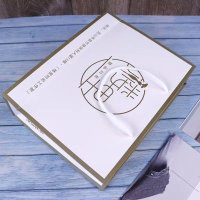 Cina sacchi di carta dell'abbigliamento di 43*12.5*32cm in vendita