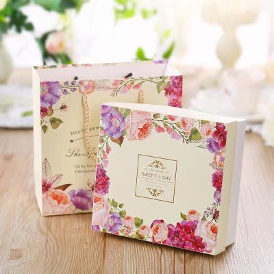 Cina 230GSM Scrunchie riciclano il contenitore di regalo pieghevole di carta 18*17*7.3 del contenitore di regalo dell'avorio in vendita
