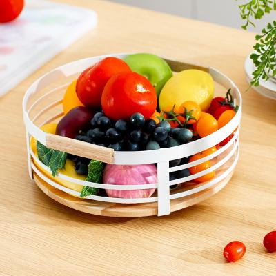 China Single Tier Modern Kitchen Organiser Wire Storage Basket with 360 Rotatable Iron for sale