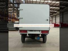 Hydraulic self-dumping wall-mounted trash transfer vehicle