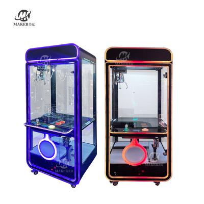 Cina Giochi a monete Macchine da gioco regalo attrezzature di intrattenimento al coperto Mini giocattolo di peluche macchina a gru con artigli in vendita