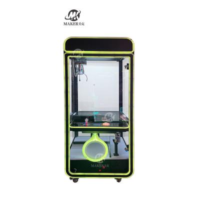 Cina Giochi a monete Macchine da gioco regalo attrezzature di intrattenimento al coperto Mini giocattolo di peluche macchina a gru con artigli in vendita