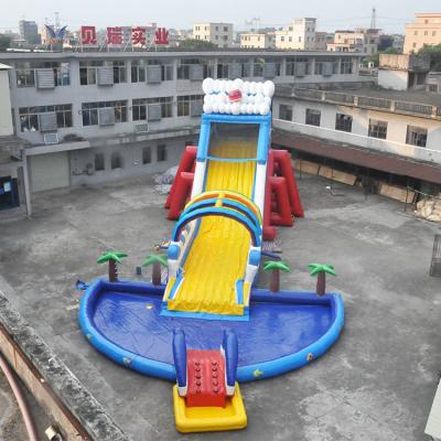China resbalón inflable largo temático y diapositiva del agua del arco iris del PVC de 0.55m m con la piscina en venta