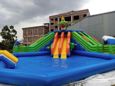 China Mobile Land Inflatable Ground Water Park With Pool Slide Waterproof for sale