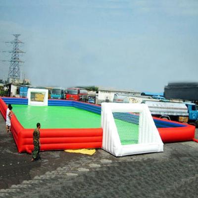 China Tarpaulin Inflatable Sports Games Soapy Soccer Field Football Bounce House for sale