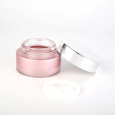 Китай Винт серебра опарника 50g розовой картины цвета стеклянный косметический вверх по крышке для сливк заботы кожи продается