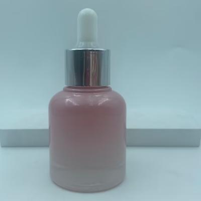 Cina Bottiglia di vetro rosa riciclabile 2025 per flaconi contagocce per oli con collare argentato, lusso all'ingrosso 30ml in vendita