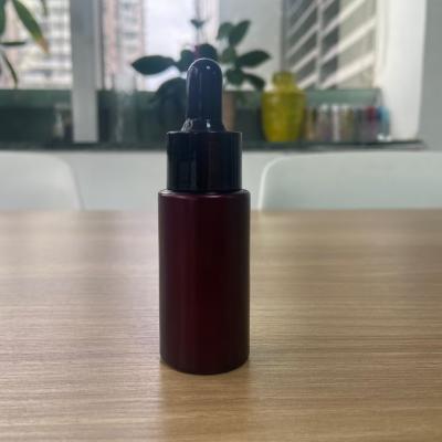 China 15ml Bottiglia di olio essenziale rosso scuro Bottiglia di goccia di vetro Imballaggio cosmetico per olio di siero Logo e verniciatura personalizzati OEM for sale