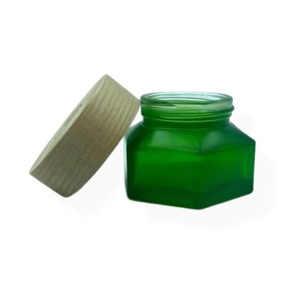 中国 化粧品のボトル 包装 50g 木の仕上げとエメラルドクリームボトル プラスチックキャップクリームボトル 販売のため