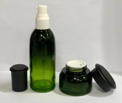 Cina Contenitori di cura di pelle di imballaggio/sicurezza del cosmetico di vetro verde/bottiglia della lozione barattolo della crema in vendita