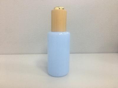 China 30ml Glass Dropper Bottles hot sell  / Glass With Bamboo Collar Essential Oil Bottles OEM for sale