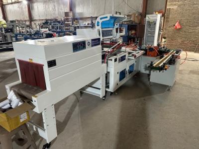 China Fully Automatic Heat Shrink Packaging Machine for 30-90mm Thermal Paper Rolls for sale