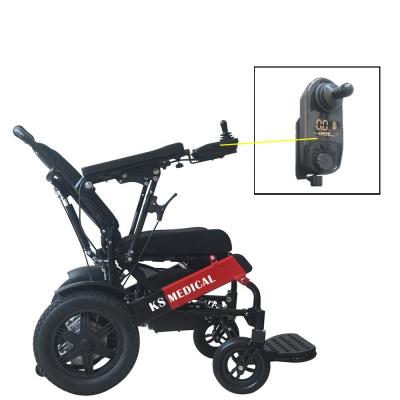 Cina KSM-601S Brushless 500W 2011 foldable wheelchair travel remote control electric wheelchair with 6AH battery reclining wheelchair in vendita