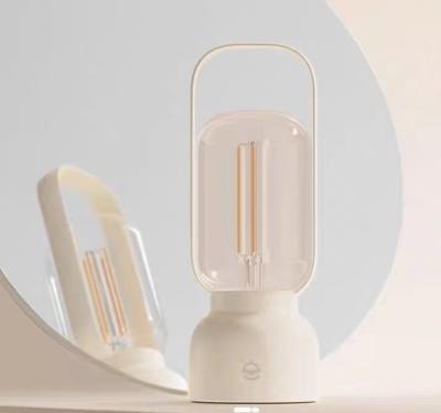 China Modern Design Night Light Festival Table Lamp with Mosquito Repellent Light and Hand Lamp for sale