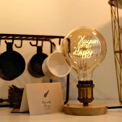 Cina Base della lampadina a filamento LED 4W vetro trasparente Amber G80/95 Serie Dimmabile Ciao Lettera d'amore in vendita