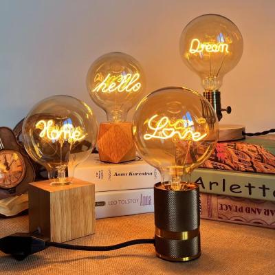 Cina Base della lampadina a filamento LED 4W vetro trasparente Amber G80/95 Serie Dimmabile Ciao Lettera d'amore in vendita