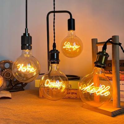 Cina 2700K GLOBE Lampada a filamento a LED 4W Vetro trasparente Amber G80/95 Serie Lampada Edison dimmabile in vendita