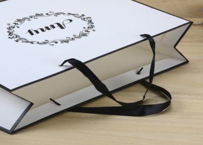 China Modern Design Paper Shopping Bags Material 200g - 350g White Card Paper for sale