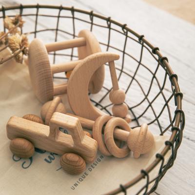 Cina 4 pc/bambini dell'insieme gioca il regalo neonato musicale di Teether di crepitio di legno naturale in vendita
