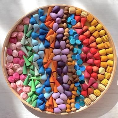中国 木コンストラクターが北欧の木の虹を置いた赤ん坊は緩い部品のMontessoriの教育おもちゃの子供の幼児の赤ん坊Gを妨げる 販売のため