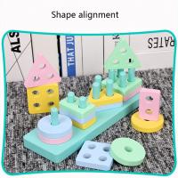 China Puzzle Wooden Stacking Blocks Baby Shape Sorting Developmental Tumble Tower for sale