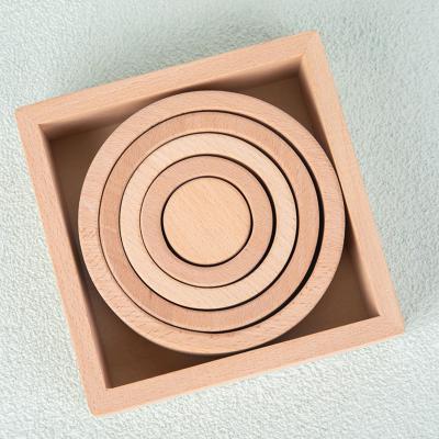Cina Il puzzle di legno di incastramento dell'impilatore blocca Montessori che impila il gioco per la scuola materna in vendita