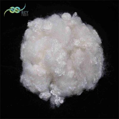 China Recycled Hollow Conjugated Fiber Flame Retardant Coiled 64mm Staple Fiber Te koop