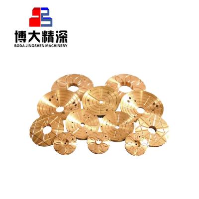 Cina Conchiglie di coni di pietra per l'estrazione di minerali Ricambi in bronzo Involucro di presa con durezza HRC58 HRC63 in vendita