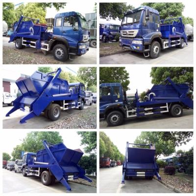 China SINOTRUK HOWO 4X2 5CBM Swing Arm Garbage Truck For Urban Garbage Clean Up for sale