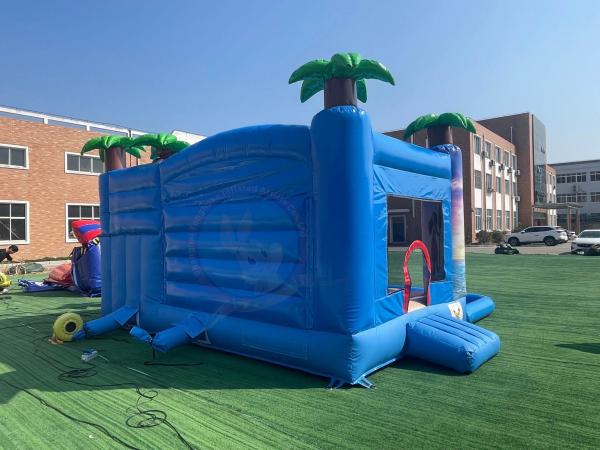 Quality Inflatable Bounce House Combo With Water Pool Slide And Palm Tree Theme Designed for sale