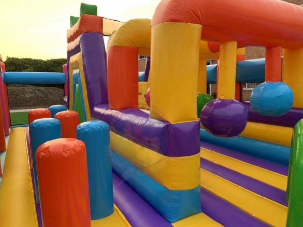 Quality Custom Inflatable Fun Park With Bounce House Slide Combo Obstacle Challenges and for sale