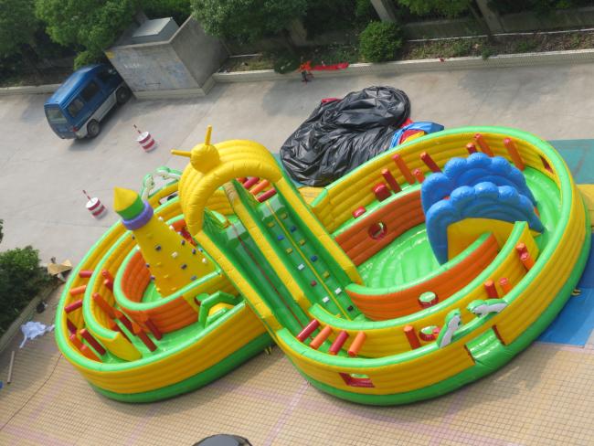 Figure-Eight Inflatable Obstacle Course with Slide for Outdoor Events view 1