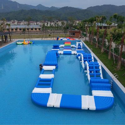 China Giant Inflatable Water Park Obstacle Course 300ft Customized Floating Park Modular Design Team Challenge for sale