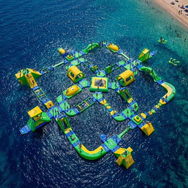 Quality Large Custom Size Inflatable Water Park with 0.9 mm PVC Tarpaulin and >500kg Capacity for Commercial Use for sale