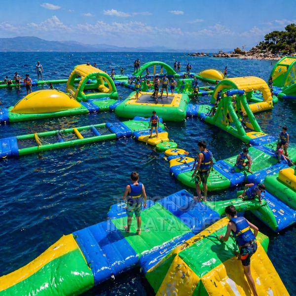 Quality Large Custom Inflatable Water Park With Floating Obstacle Course And Slide for sale