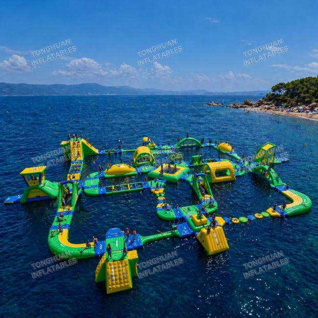 Commercial floating aqua park installation in a lake setting