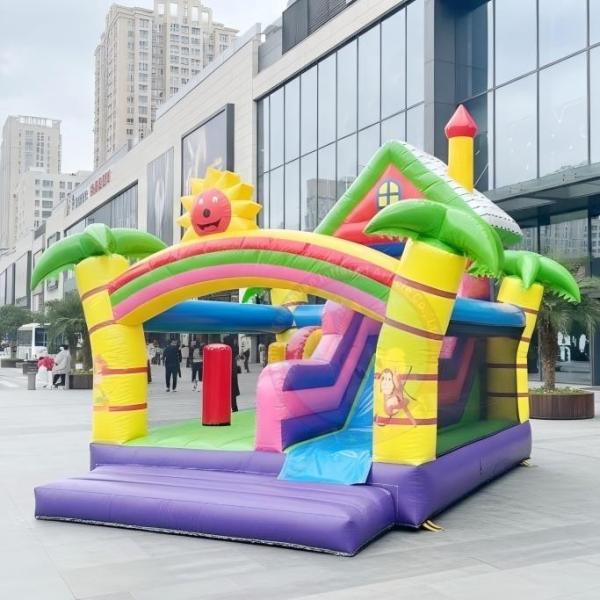 Quality Commercial Tropical Theme Inflatable Bouncer Castle Designed With Cartoon Artwork Slide Play Zone and Bright Colors for Mall Plaza Kids Entertainment Use for sale