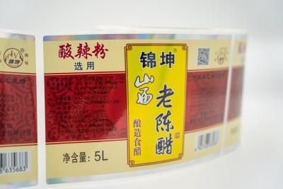China Removable Custom Waterproof Labels For Bottles Adhesive Clear Tamper Proof Stickers for sale