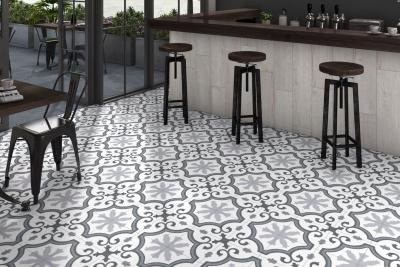 Cina Piastrelle rustiche in ceramica grigie impermeabili da 25x25 cm per il soggiorno e piastrelle ecologiche per la decorazione in vendita