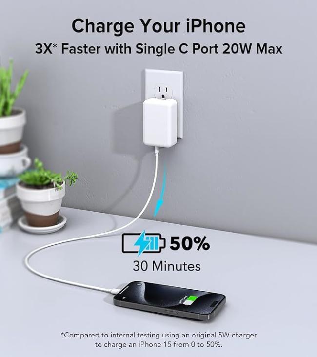 Front view of universal travel charger showing foldable plug design