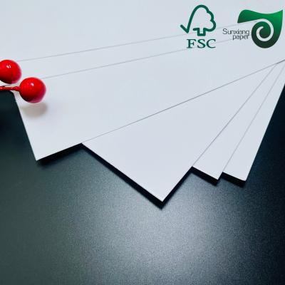 China FSC 300gsm Double Side Coated Cardboard For Game Cards  70cm 100cm C2S Art Board for sale