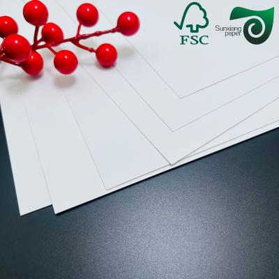 China 215g 235g FSC White Food Grade Single Sided Coated Board Food Packaging Grade for sale