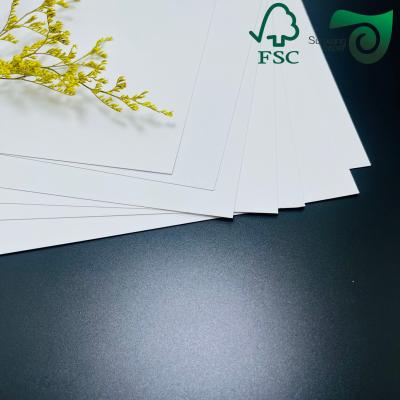 China 255gsm FSC Single Sided Coated Ivory White Cardboard  High Bulk Low Grammage Writing Friendly for sale